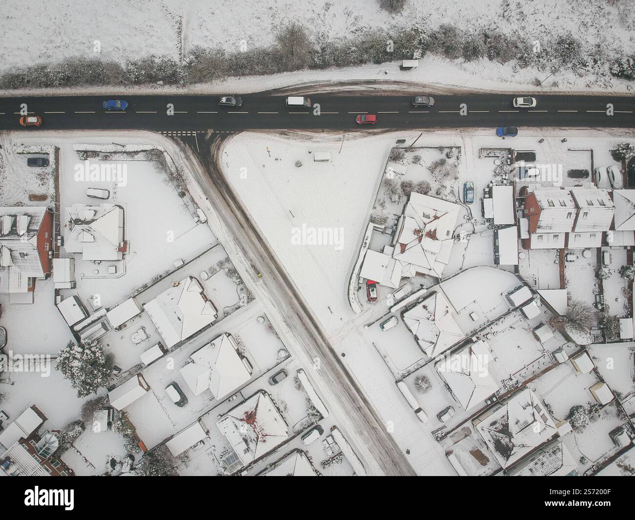 An aerial shot of the treacherous snow covered suburban back streets of ...