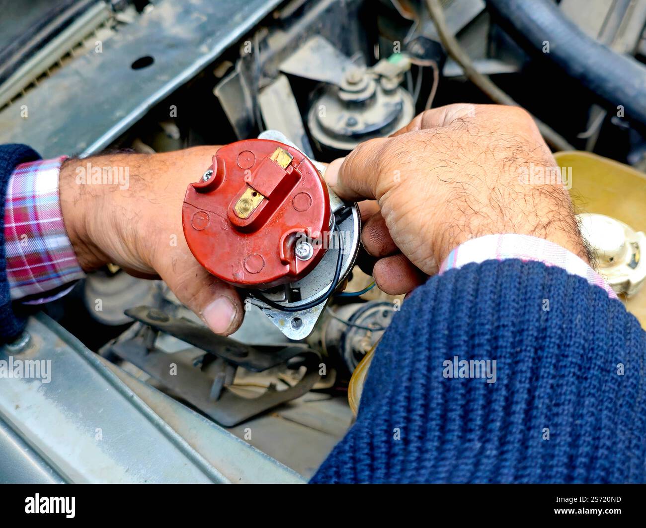 maintenance and service of car distributor, an electric and mechanical ...