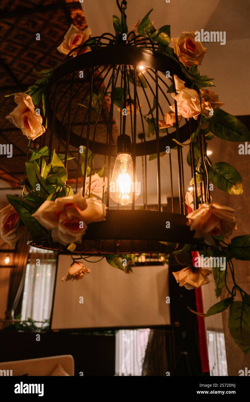 Glowing Edison bulbs create a cozy and inviting atmosphere in a cafe ...