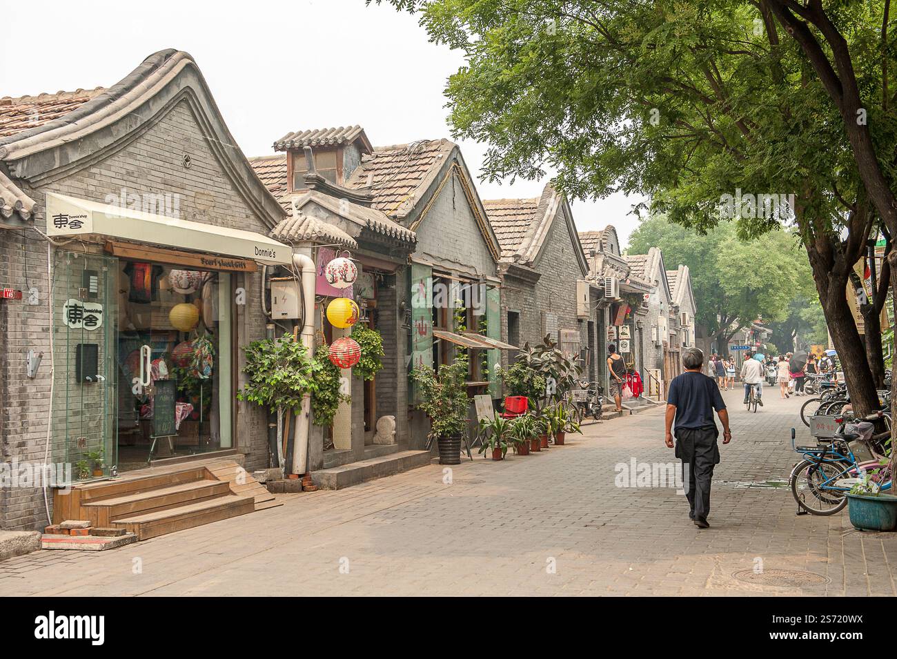 Urban scene from the Jing Yang Hutong of Beijing. The Hutongs provide a ...