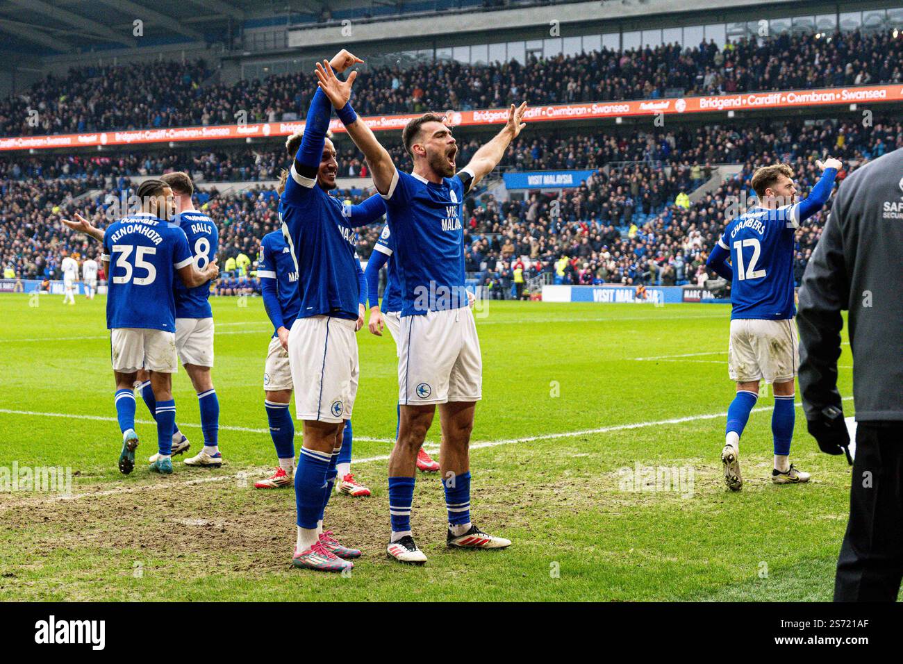 Cardiff, UK. 18th Jan, 2025. Dimitris Goutas and Callum Robinson of Cardiff City celebrate their ...