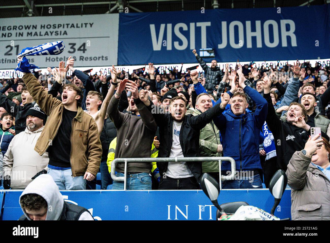 Cardiff, UK. 18th Jan, 2025. Cardiff City fans celebrate their third ...
