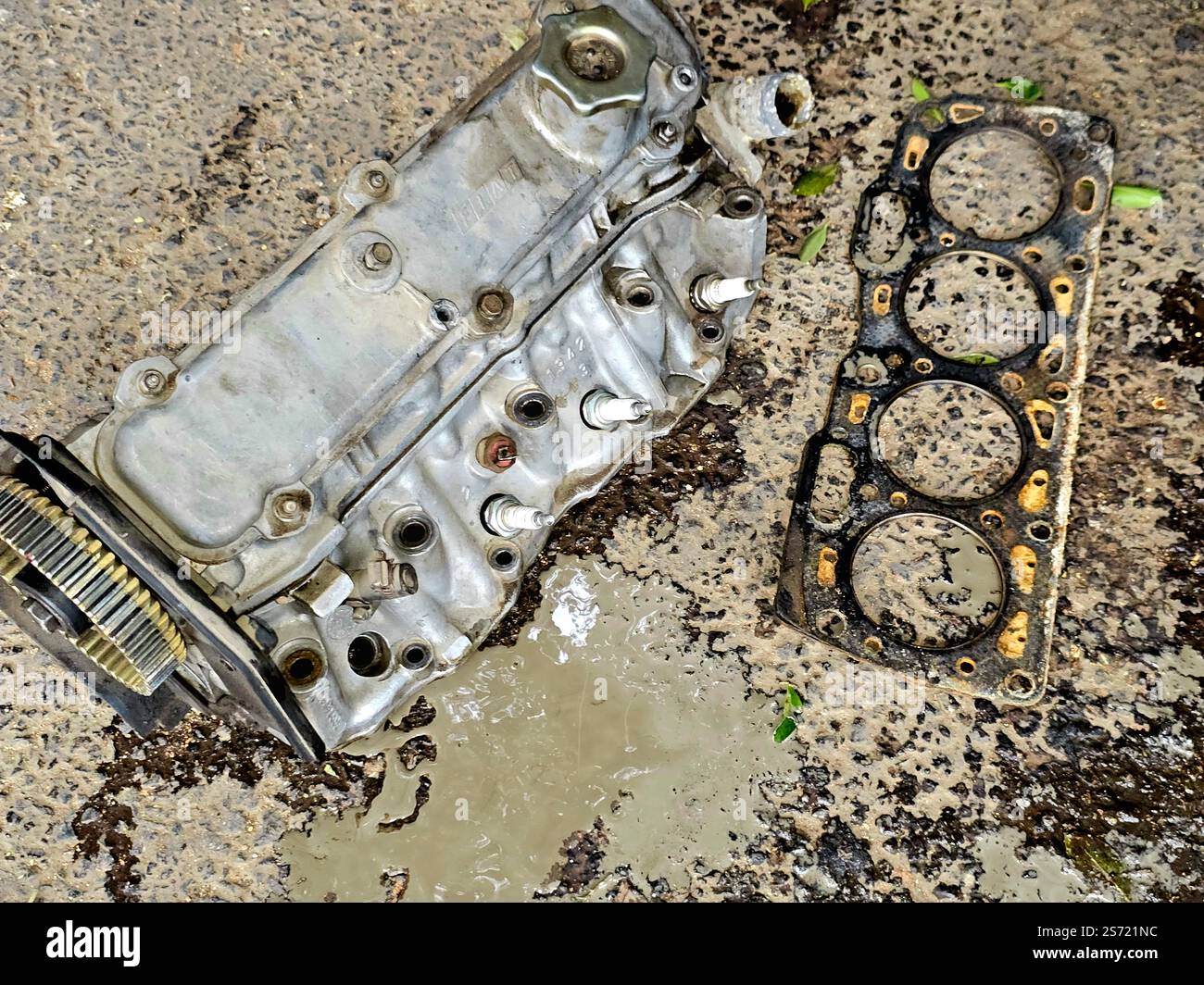 broken cylinder head gasket of the vehicle, with the Tahini like liquid ...