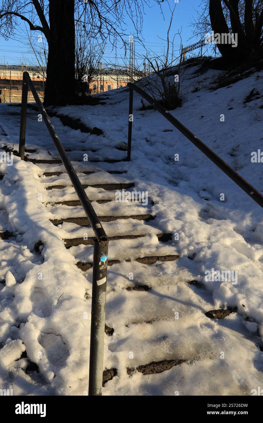 Outdoor stairs with steps not cleared of ice and snow after snow ...