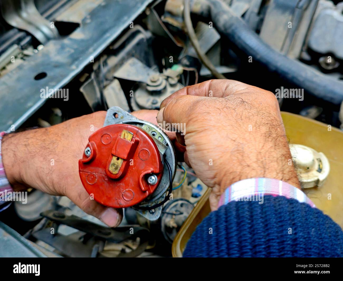 maintenance and service of car distributor, an electric and mechanical ...