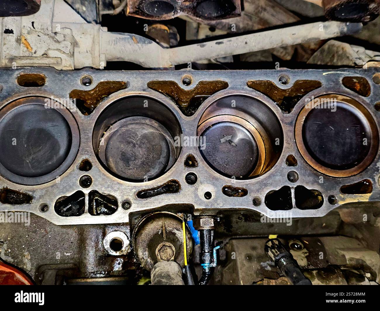 maintenance of automotive internal combustion engine, replacement of ...