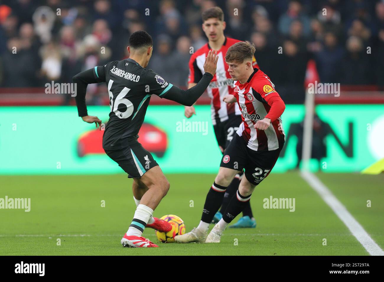 Brentford, UK. 18th Jan 2025. Brentford's Keane Lewis-Potter battles ...