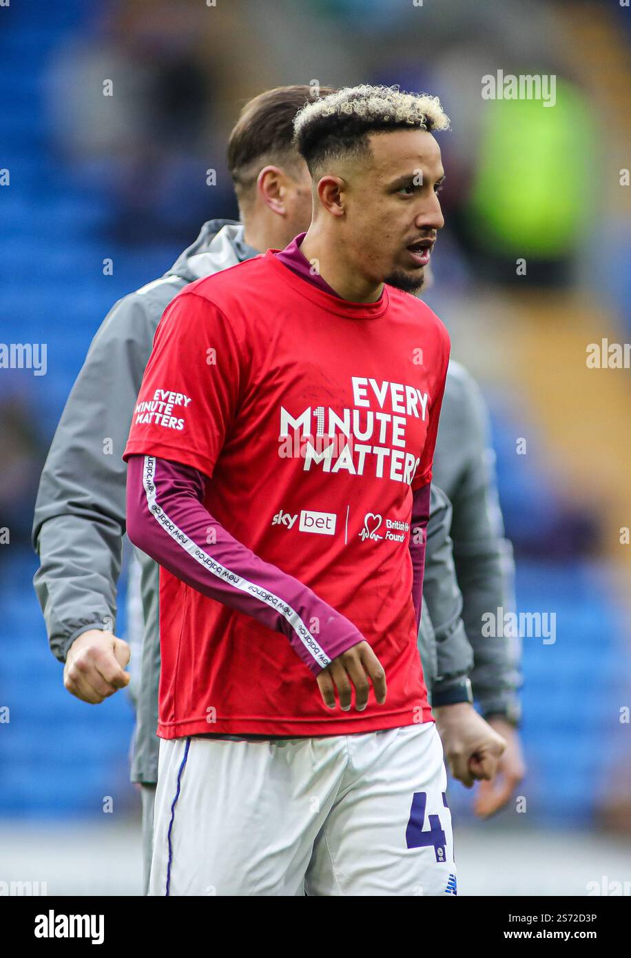 Cardiff, UK. 18th Jan, 2025. Callum Robinson of Cardiff City warms up ...
