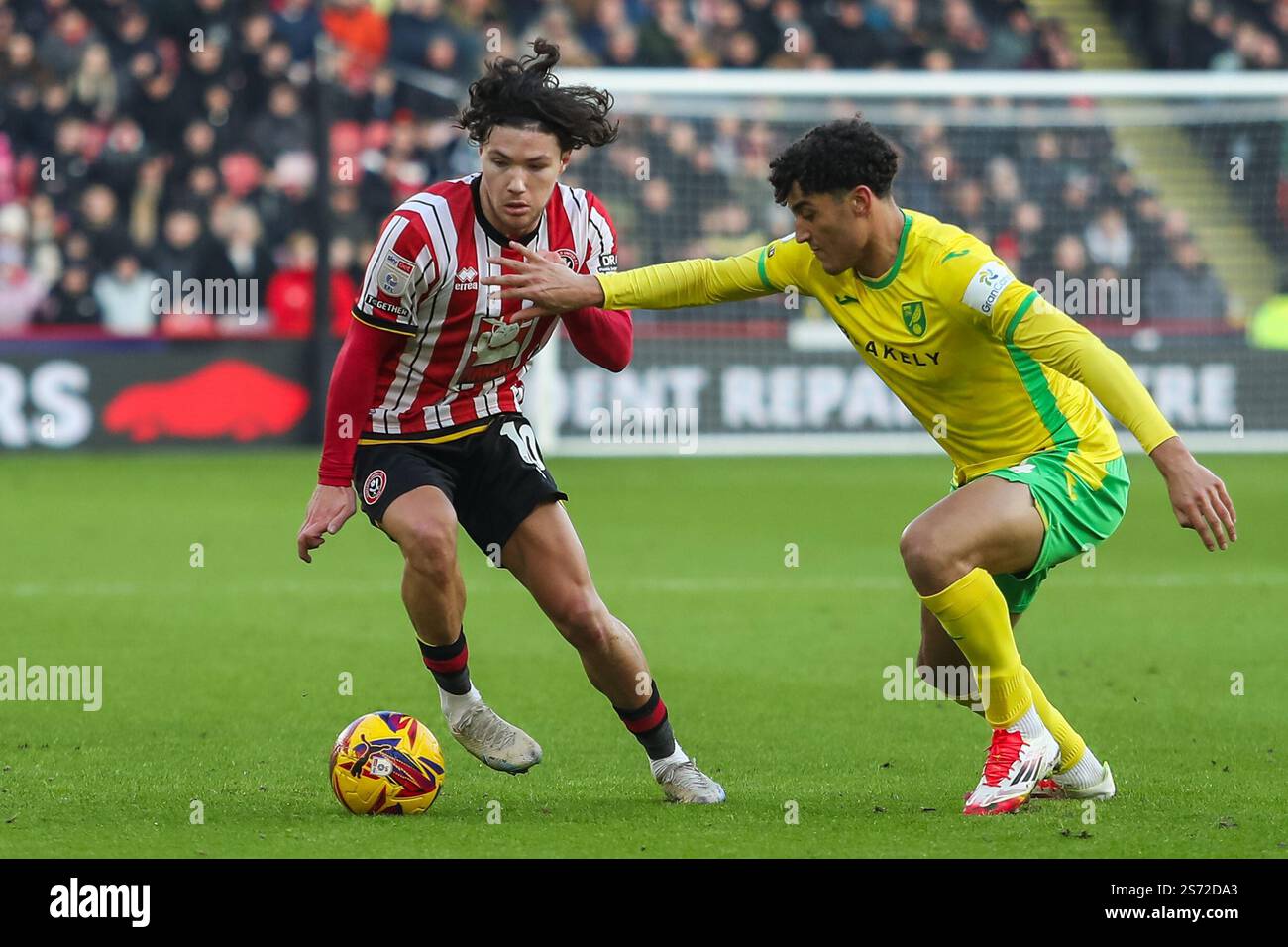 Ben Chrisene Of Norwich City battles with Callum O'Hare Of Sheffield ...