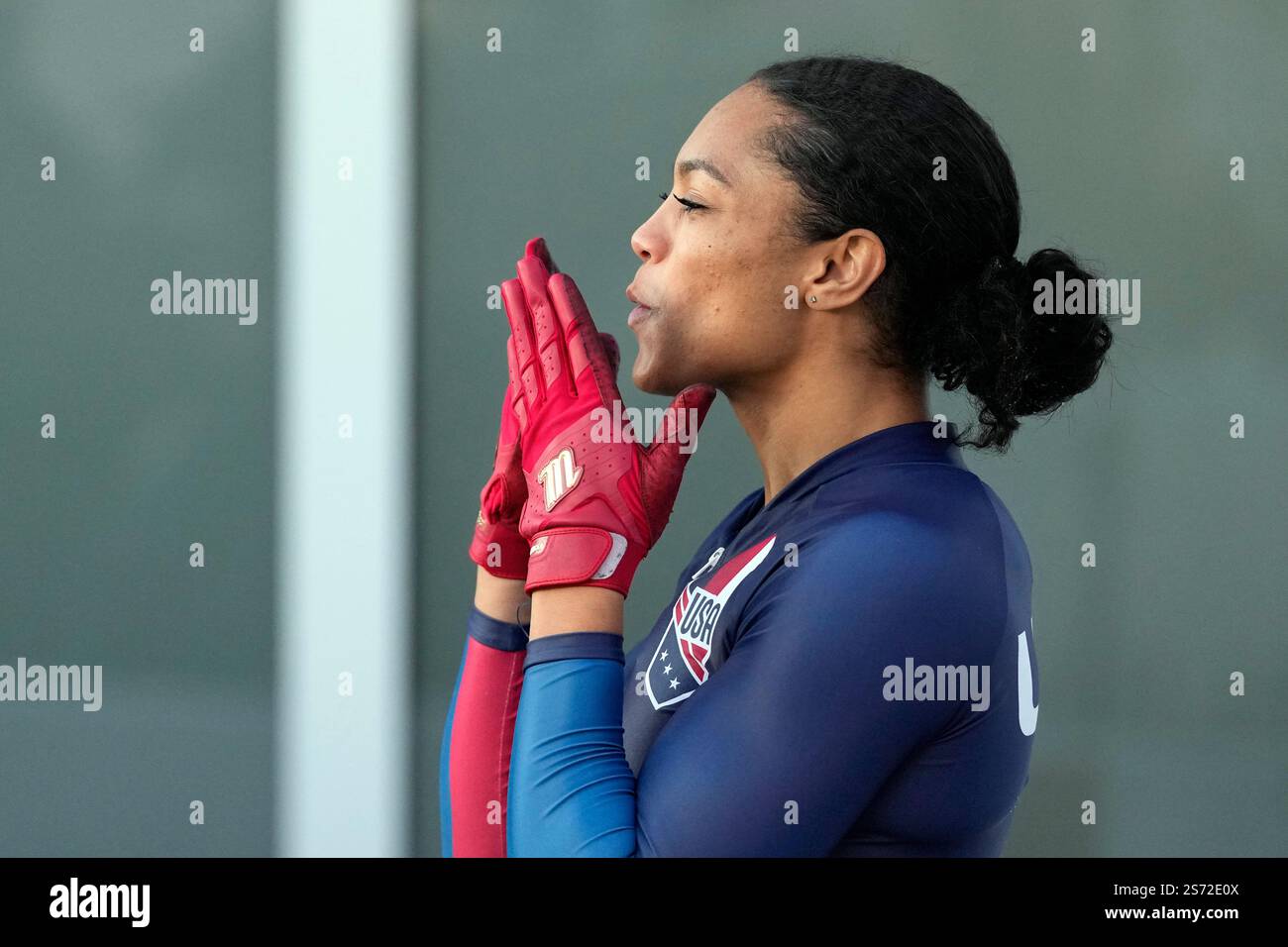 Kaysha Love, of the United States, blows a kiss after completing her ...