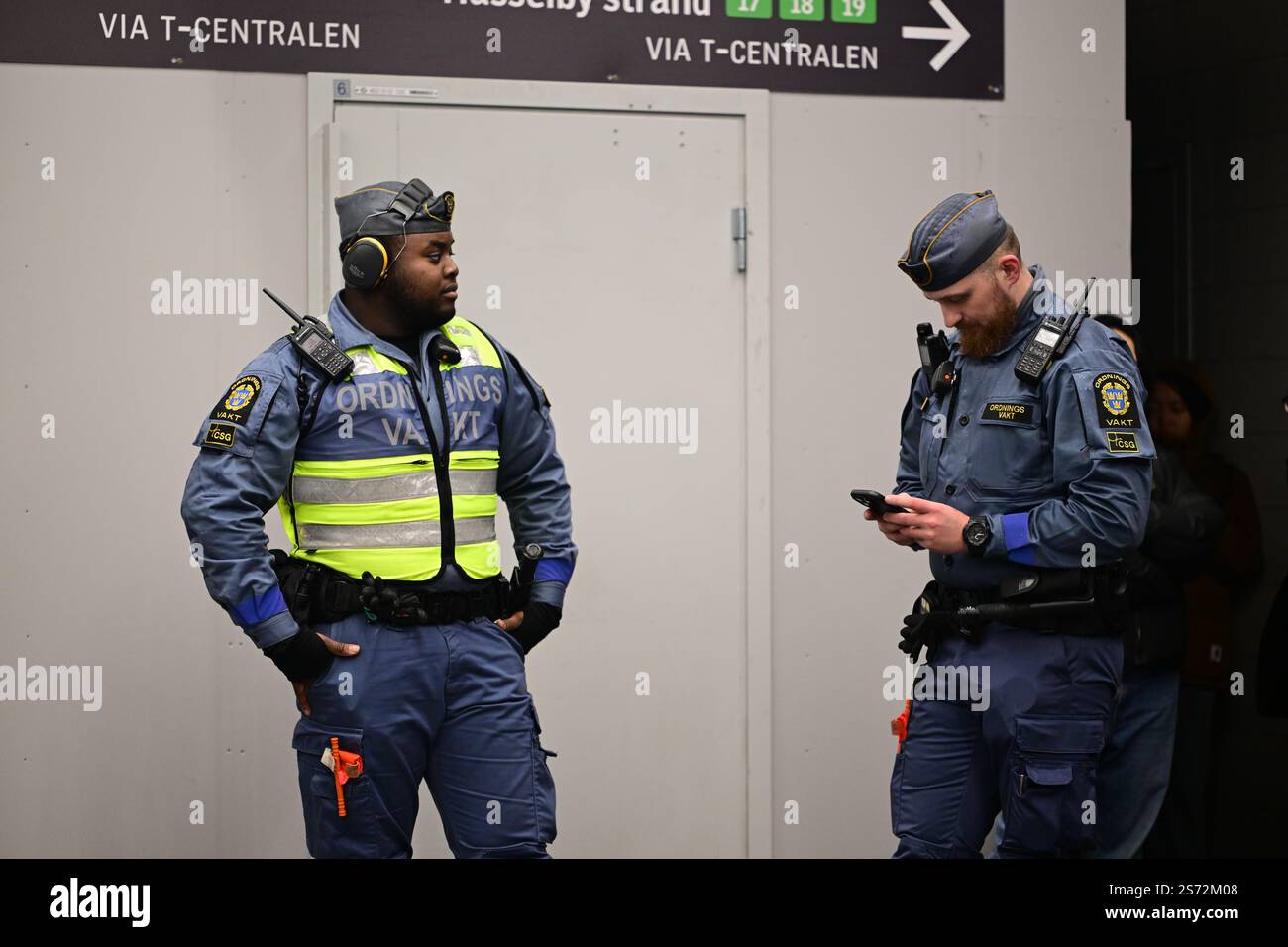 Stockholm, Uppland, Sweden. January 1 2025. Police and security guards ...