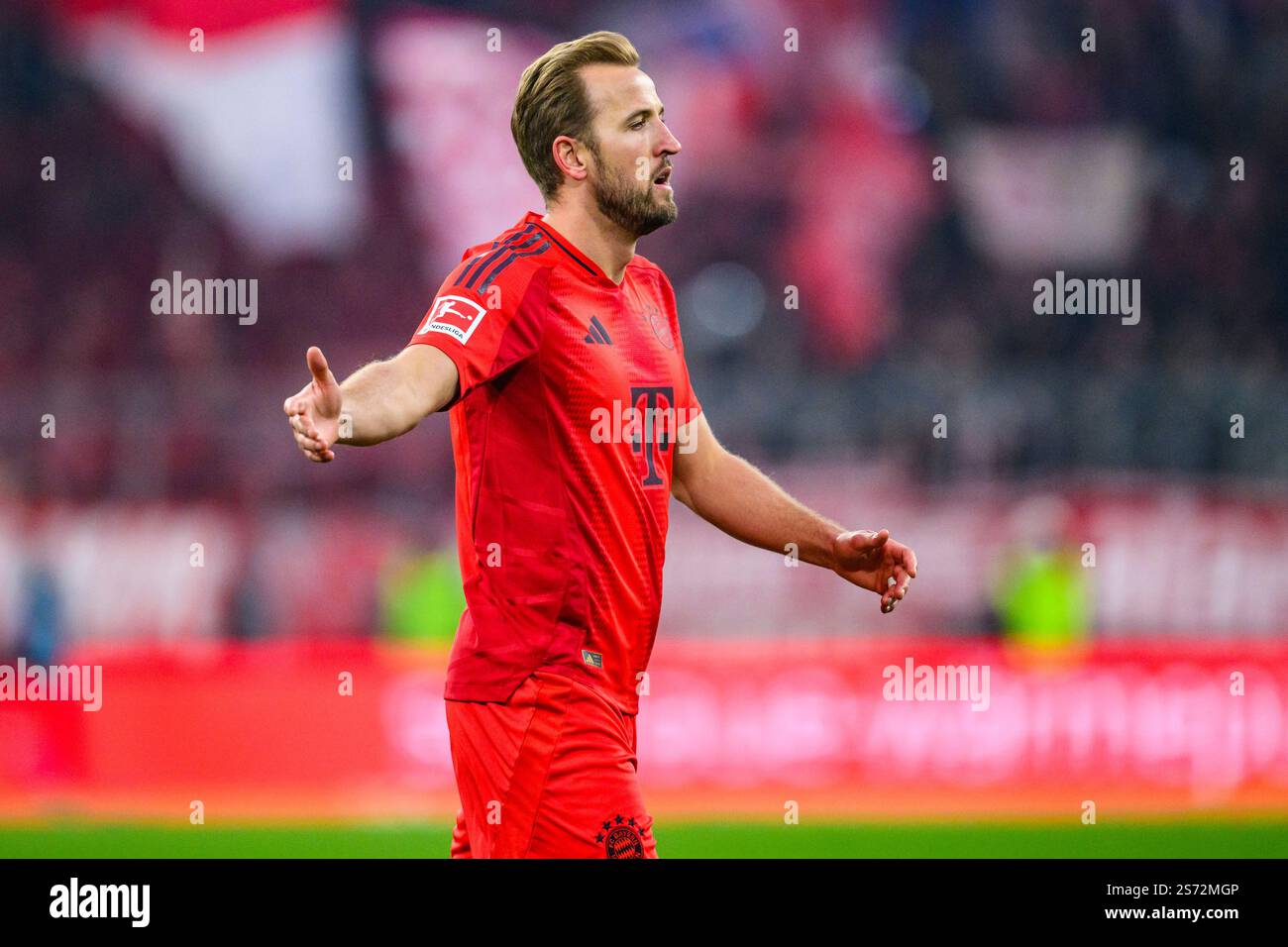 Munich's Harry Kane reacts during the German Bundesliga soccer match ...