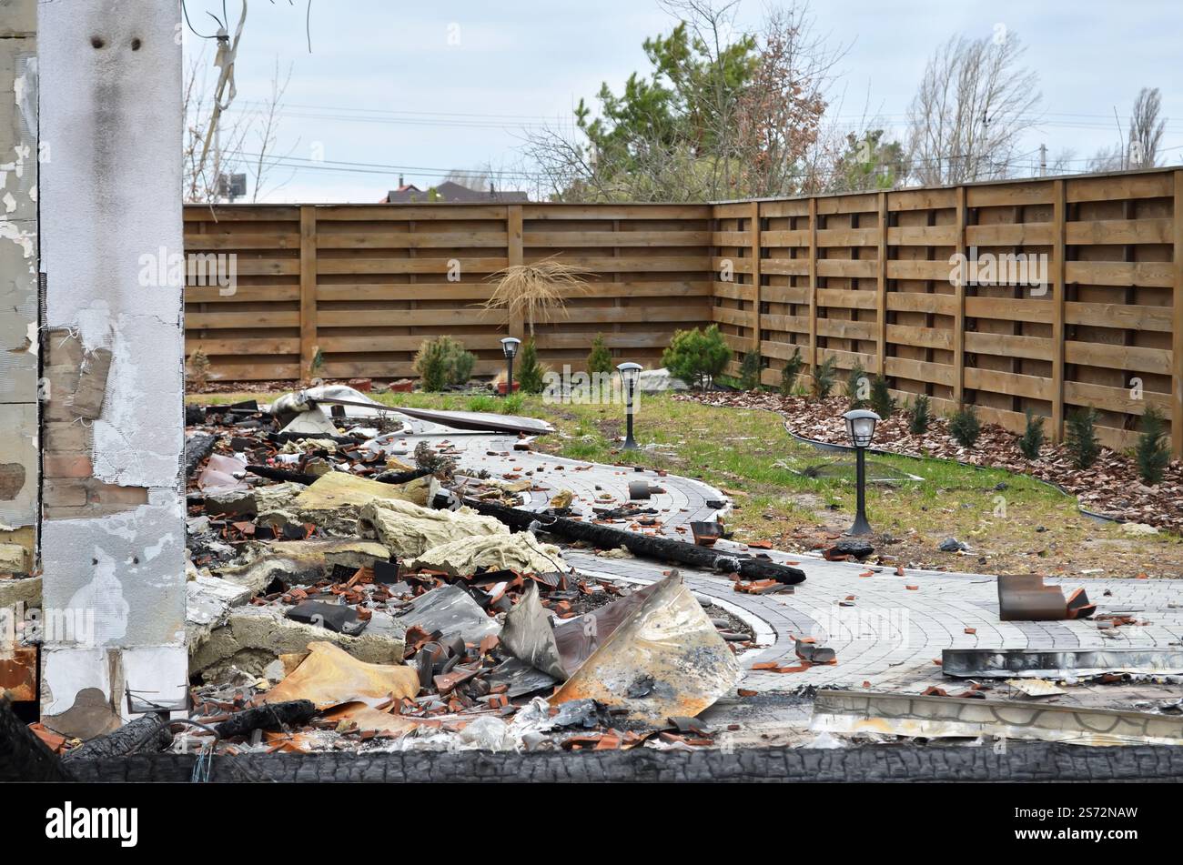 Damage from a devastating fire that destroyed a private home. Charred ...