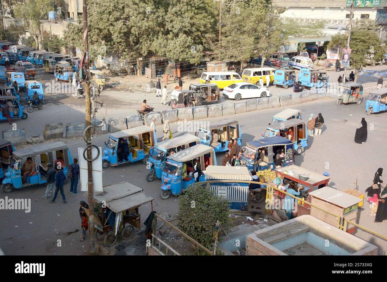 View of illegal encroachment on the road and footpath causing of ...