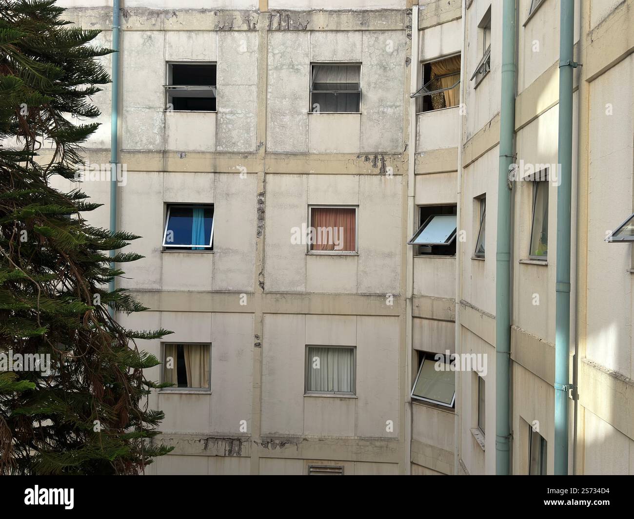 View of the Pagni Hospital with its many floors and windows and a tall ...