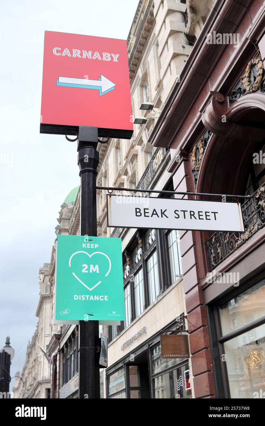 Signs in Regent Street showing Beak Street, directions to Carnaby and ...