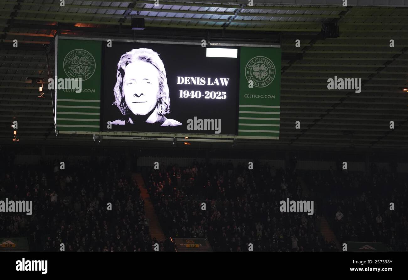 The stadiums big screen displays a tribute for former footballer Denis ...