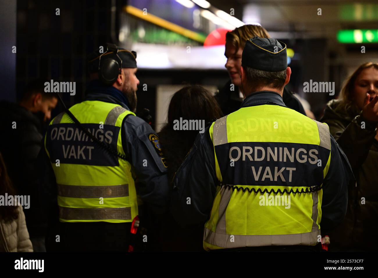 Stockholm, Uppland, Sweden. January 1 2025. Police and security guards ...