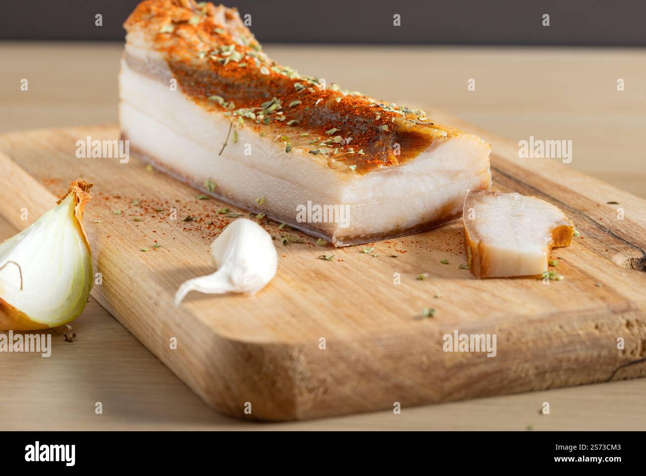 Piece of cured pork belly, a traditional Romanian delicacy called ...