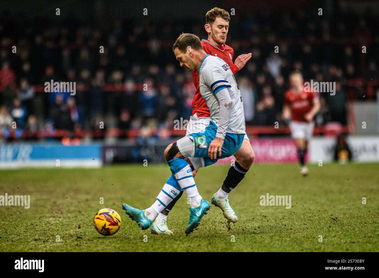 Mickey Demetriou of Crewe Alexandra FC tackles Morecambe FC's Ben ...