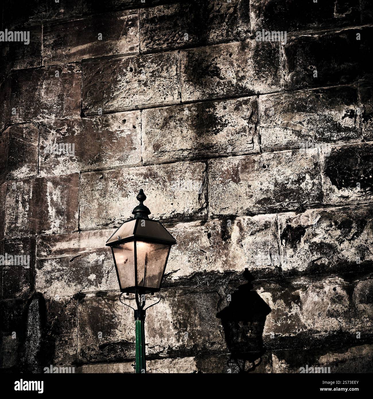 Victorian style lamp post burning inside railway arch Stock Photo - Alamy