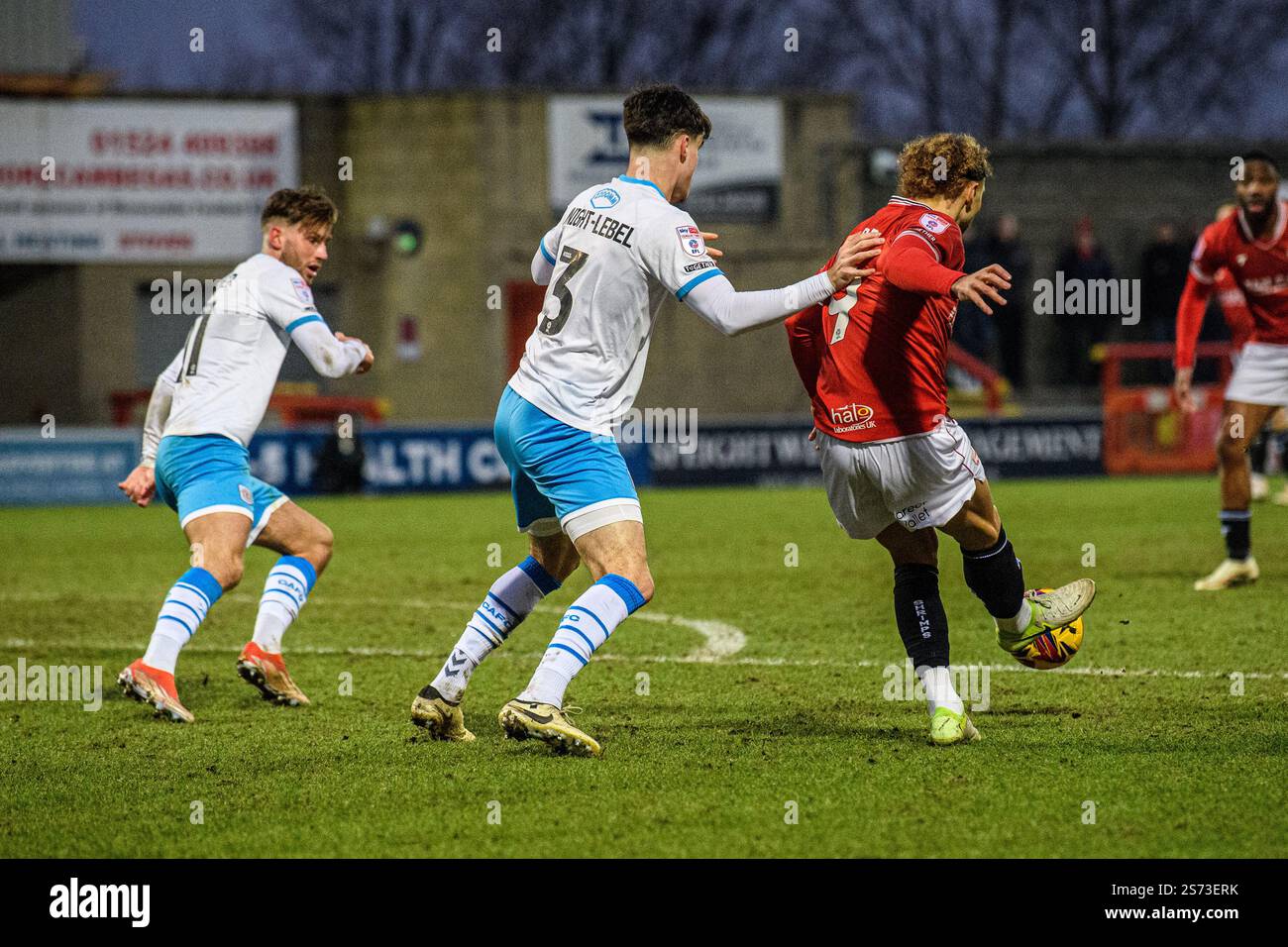 Morecambe FC's Hallam Hope under pressure from Jamie Knight-Lebel of ...
