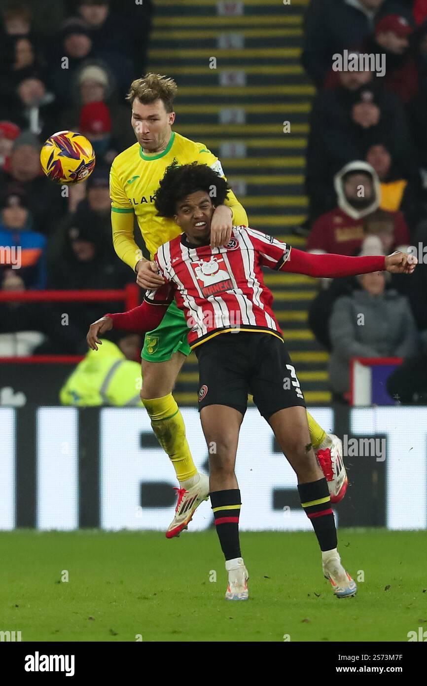 Jack Stacey Of Norwich City jumps for a header with Sam McCallum Of ...
