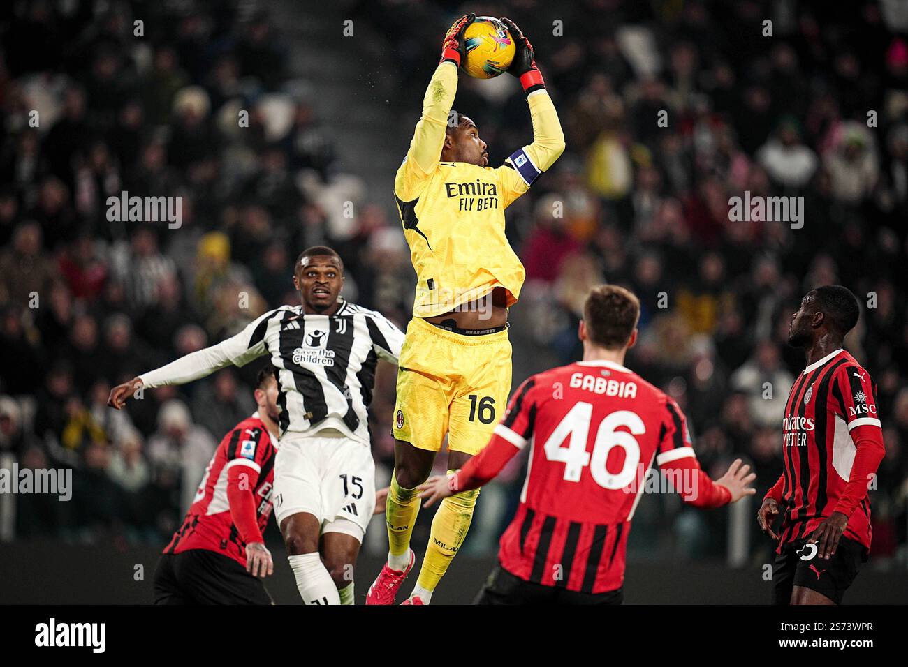 AC Milan goalkeeper Mike Maignan grabs the ball during the Italian ...