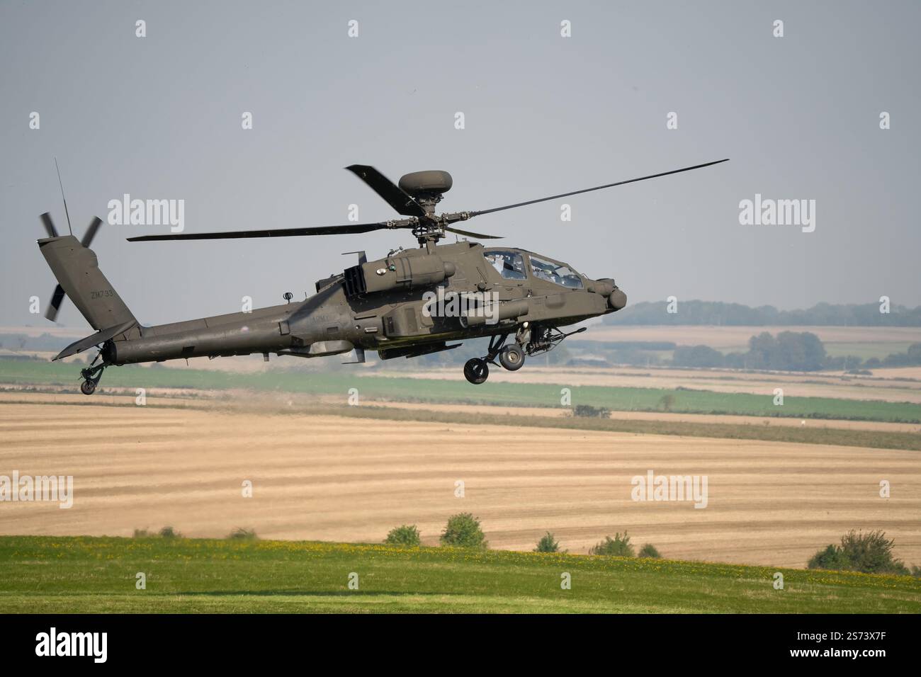 right side view of a British army Boeing Apache Longbow Attack helicopter gunship AH2 AH64E AH ...
