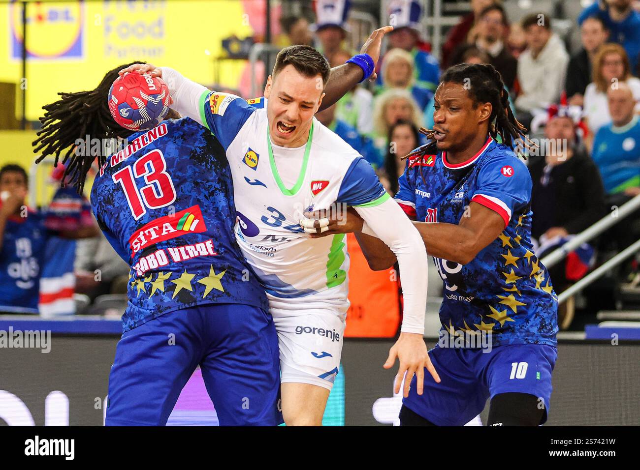 ZAGREB, CROATIA - JANUARY 18: Rok Ovnicek of Slovenia is challenged by ...