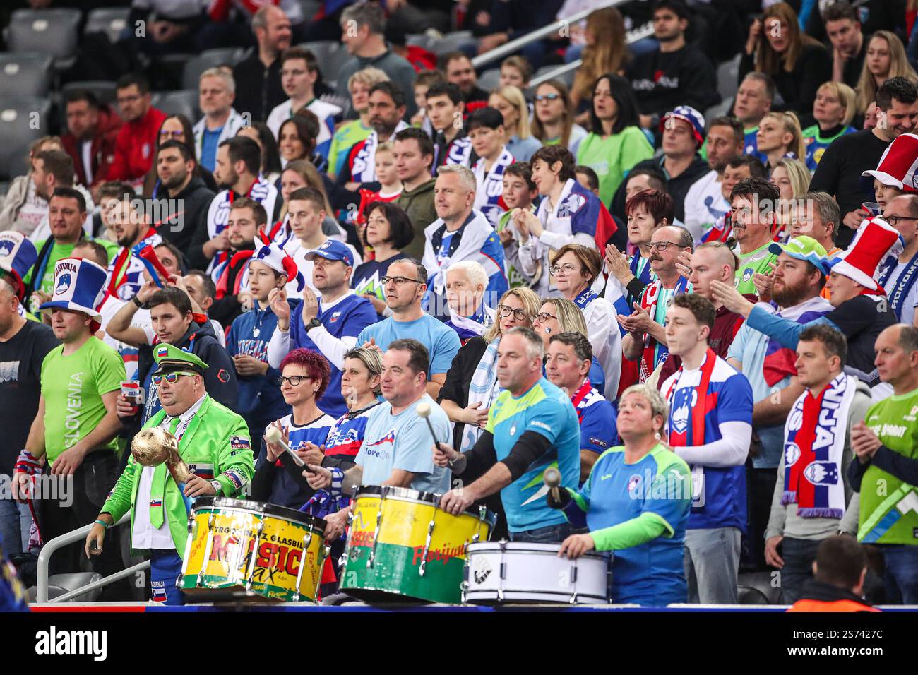 ZAGREB, CROATIA - JANUARY 18: Slovenian fans cheer on the stands during ...