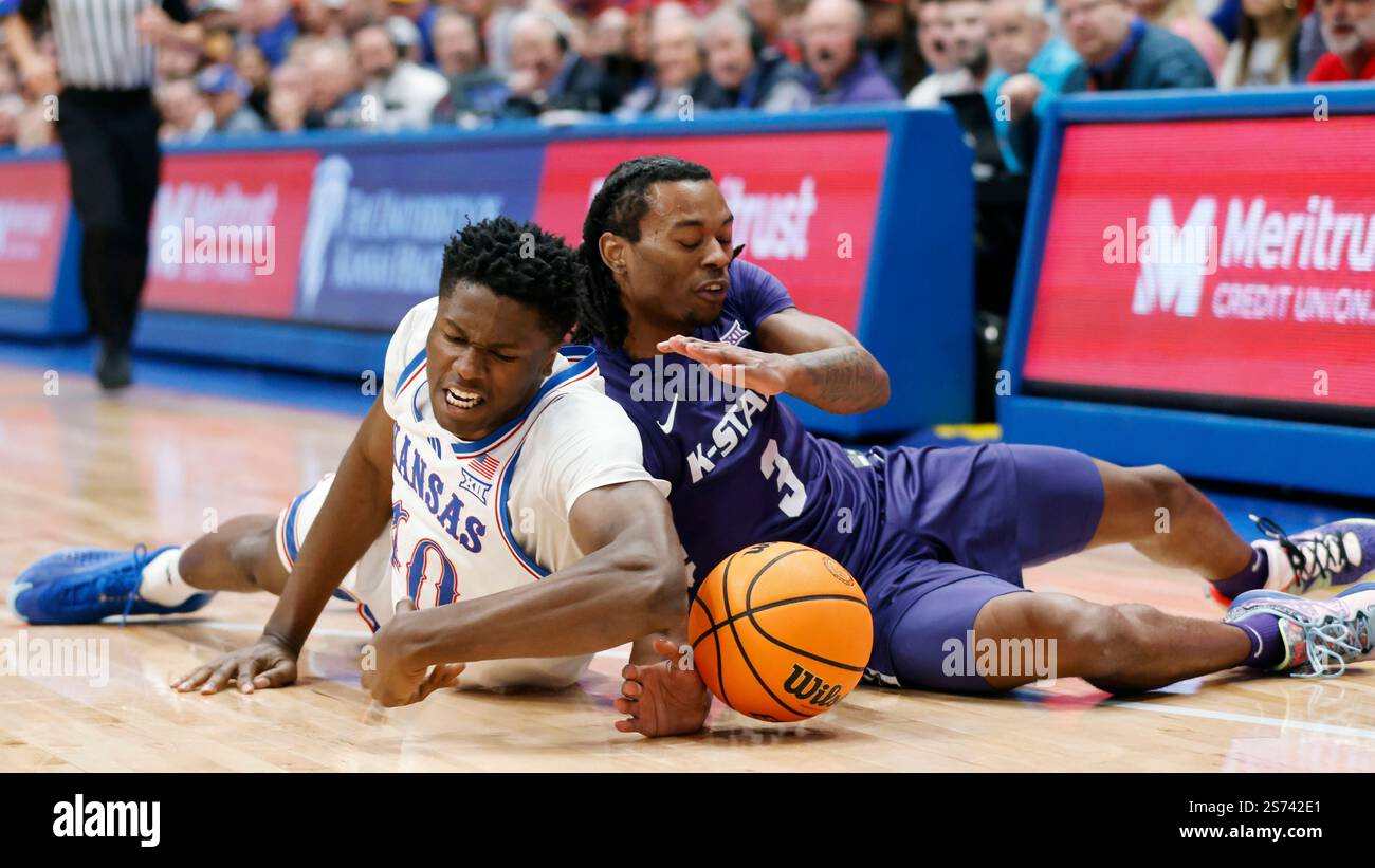 Kansas forward Flory Bidunga, left, and Kansas State guard C.J. Jones ...