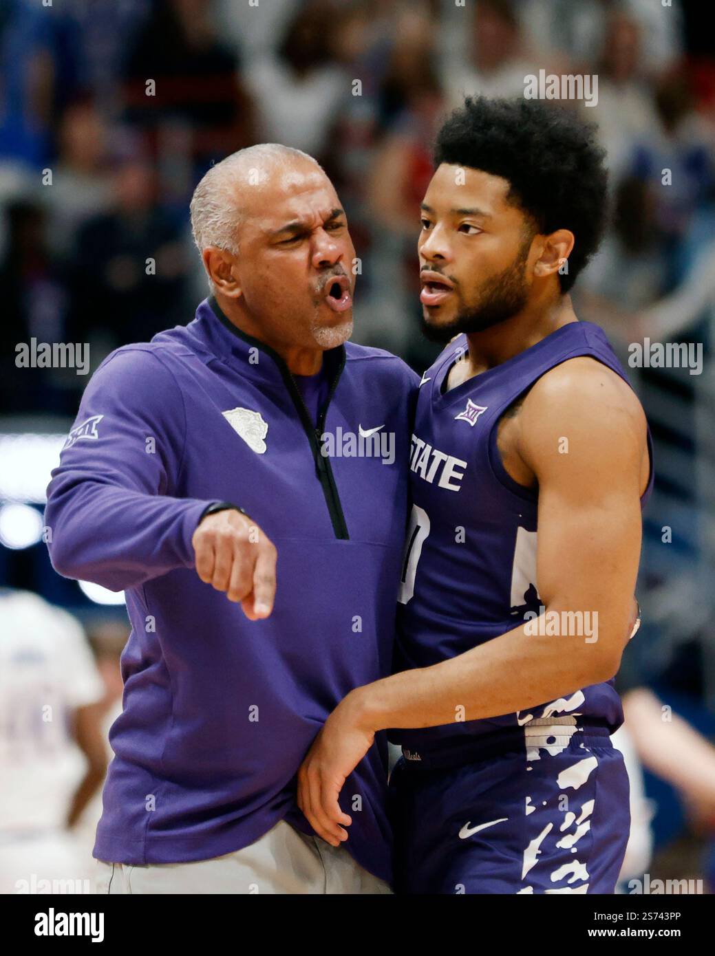 Kansas State head coach Jerome Tang, left, speaks with David Castillo ...