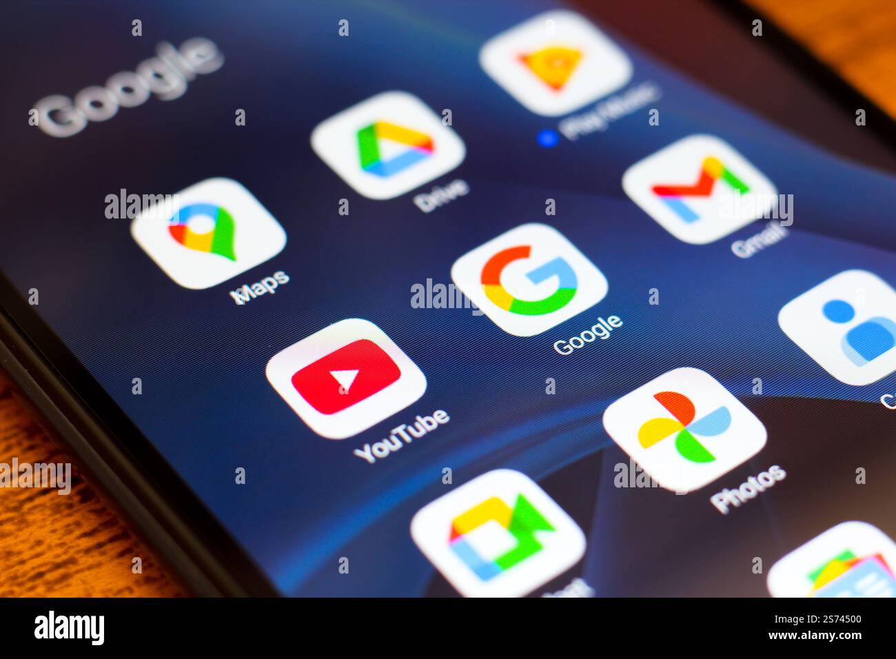 In this photo illustration, the Google Maps, Google Drive, Google Play Music, YouTube, Google ...