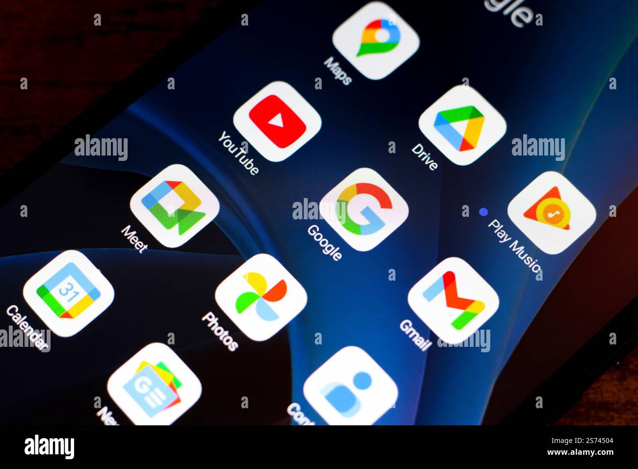 In this photo illustration, the Google Maps, Google Drive, Google Play Music, YouTube, Google ...