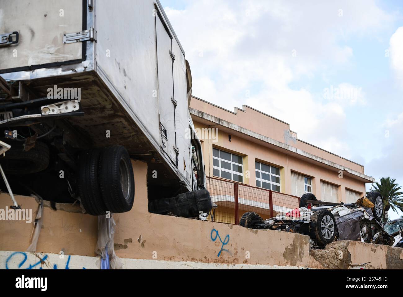 Derailed truck doble set of tires on the edge of a tunnel wall with a ...