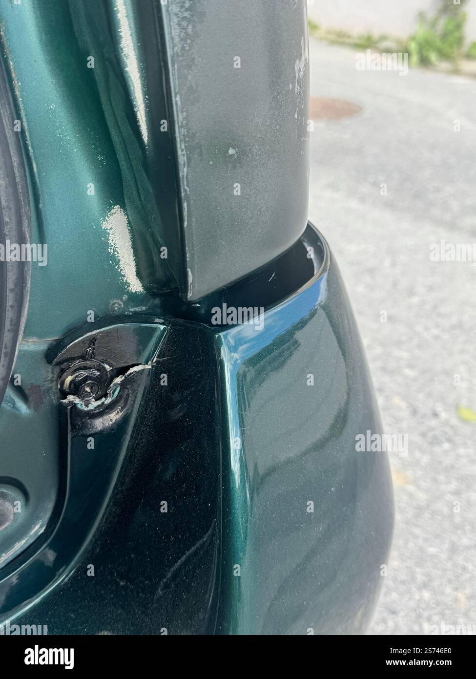 The rear bumper bracket was sheared off where the screw grips after a ...