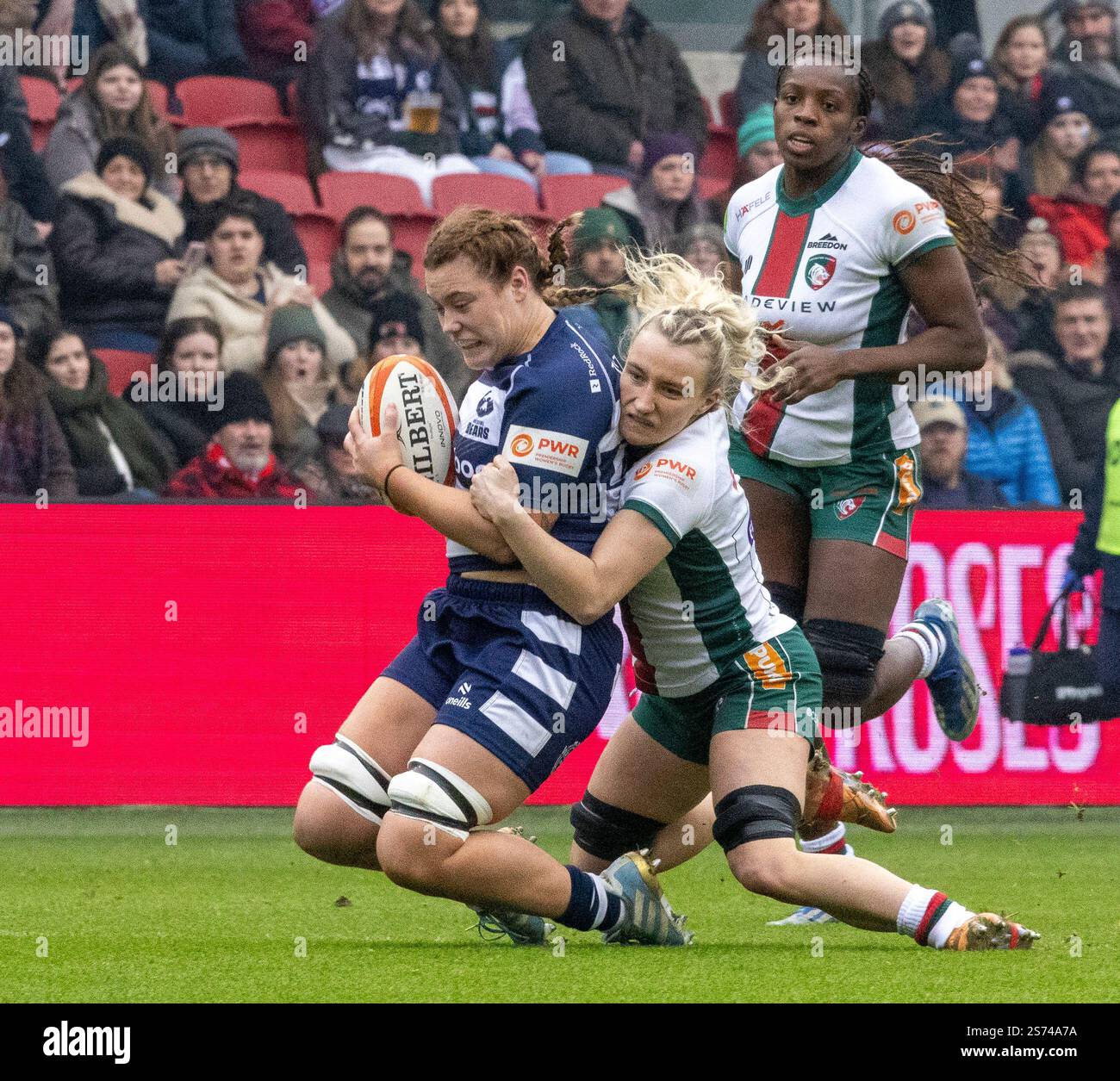 Bristol's Delaney Burns tackled by Leicester Tigers player during PWR ...