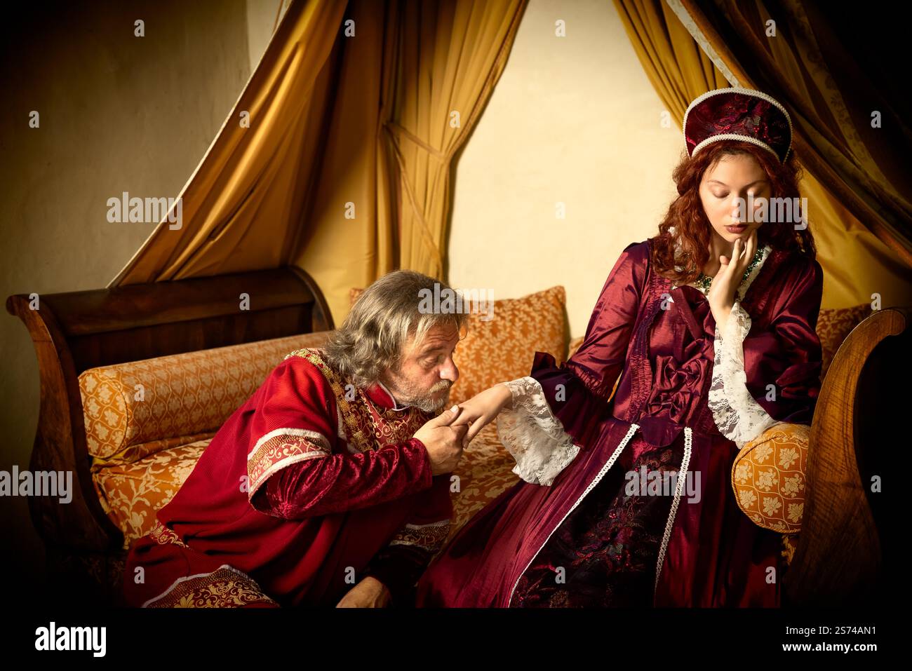 Medieval Renaissance king and queen in Tudor style costumes reenactment ...