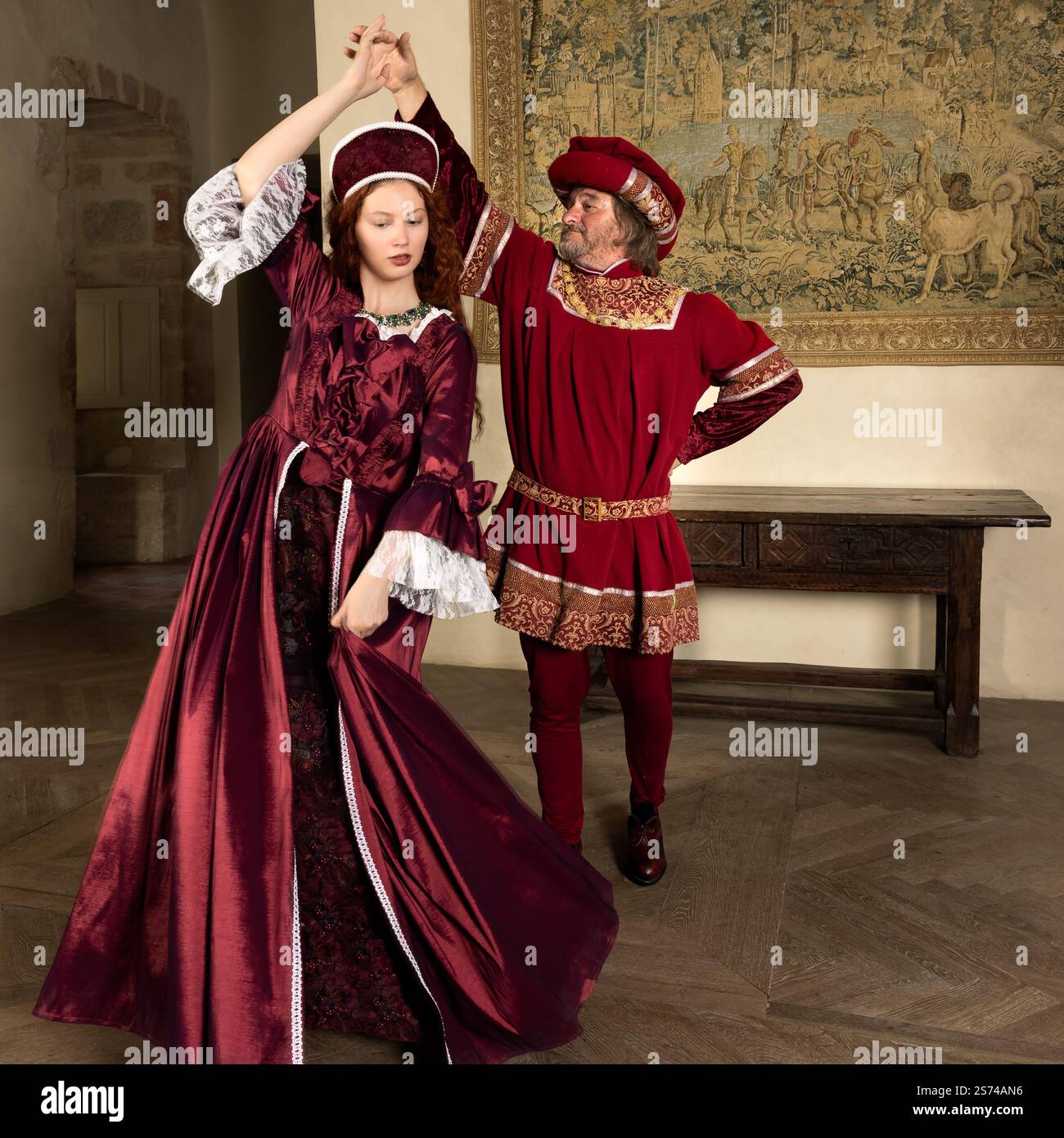 Medieval Renaissance king and queen in Tudor style costumes reenactment ...
