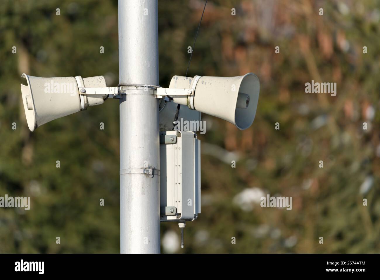 Damaged vintage town broadcast speaker siren in residential area in ...