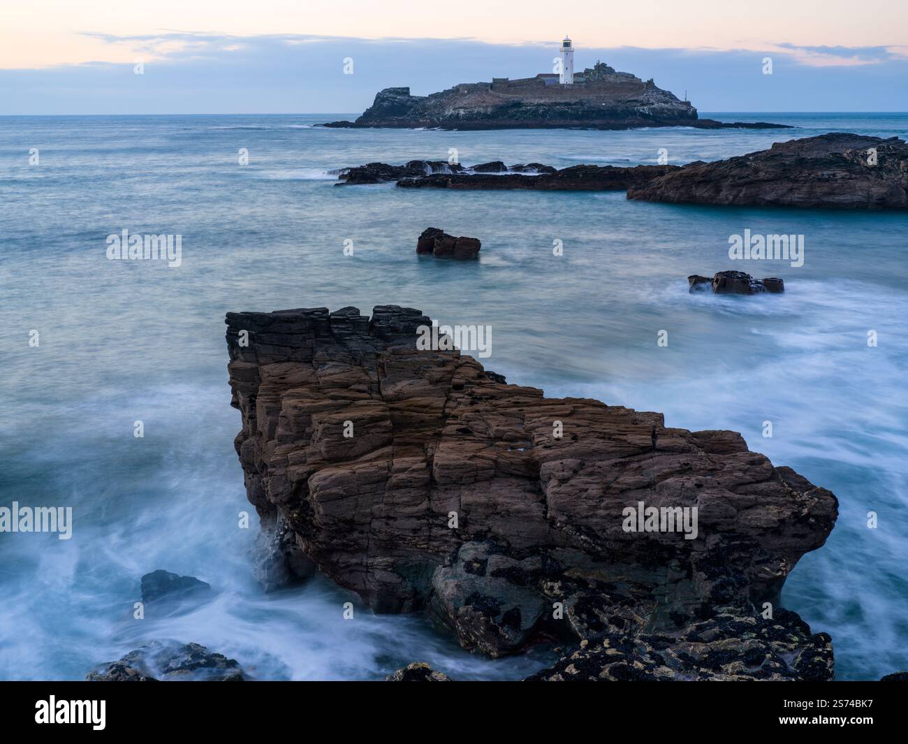 Godrevy Lighthouse and Rocks high tide Hayle Cornwall Stock Photo - Alamy