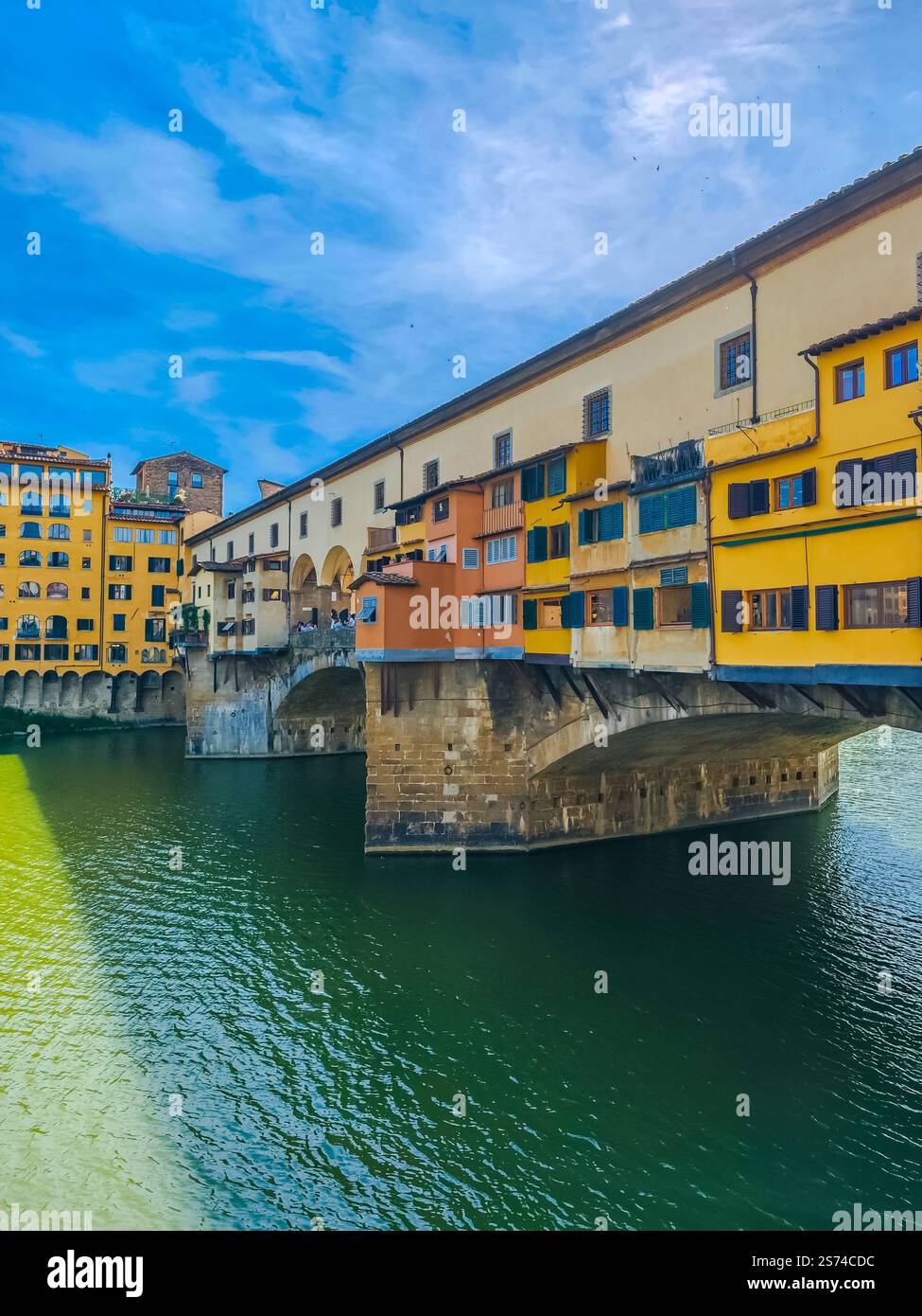 Ponte Vecchio bridge over Arno River in Florence. Picturesque medieval ...