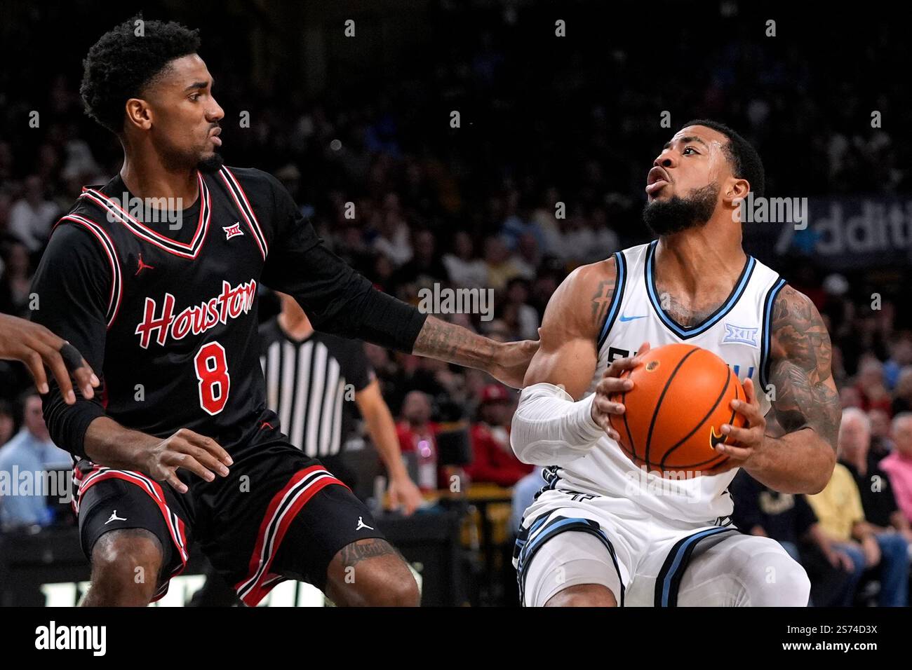 Central Florida guard Darius Johnson, right, looks for a shot against ...