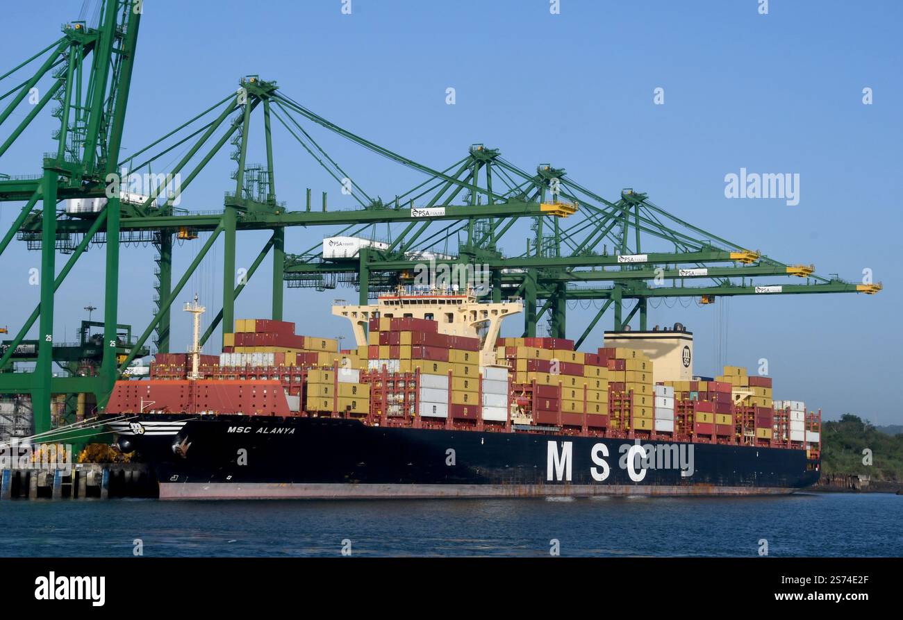 Balboa, USA. 13th Jan, 2025. Containers are loaded on and off ships at ...