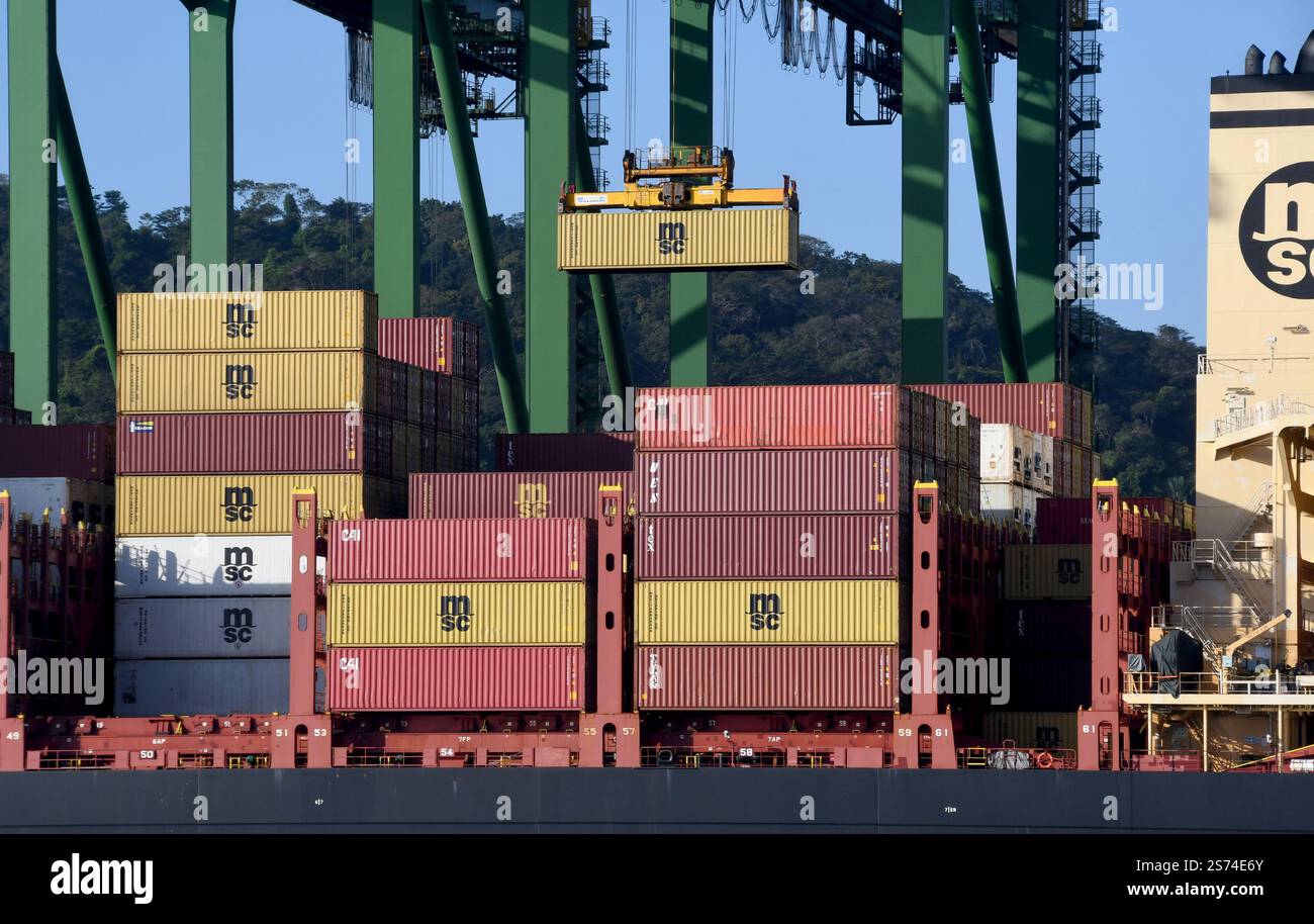 Balboa, USA. 13th Jan, 2025. Containers are loaded on and off ships at ...