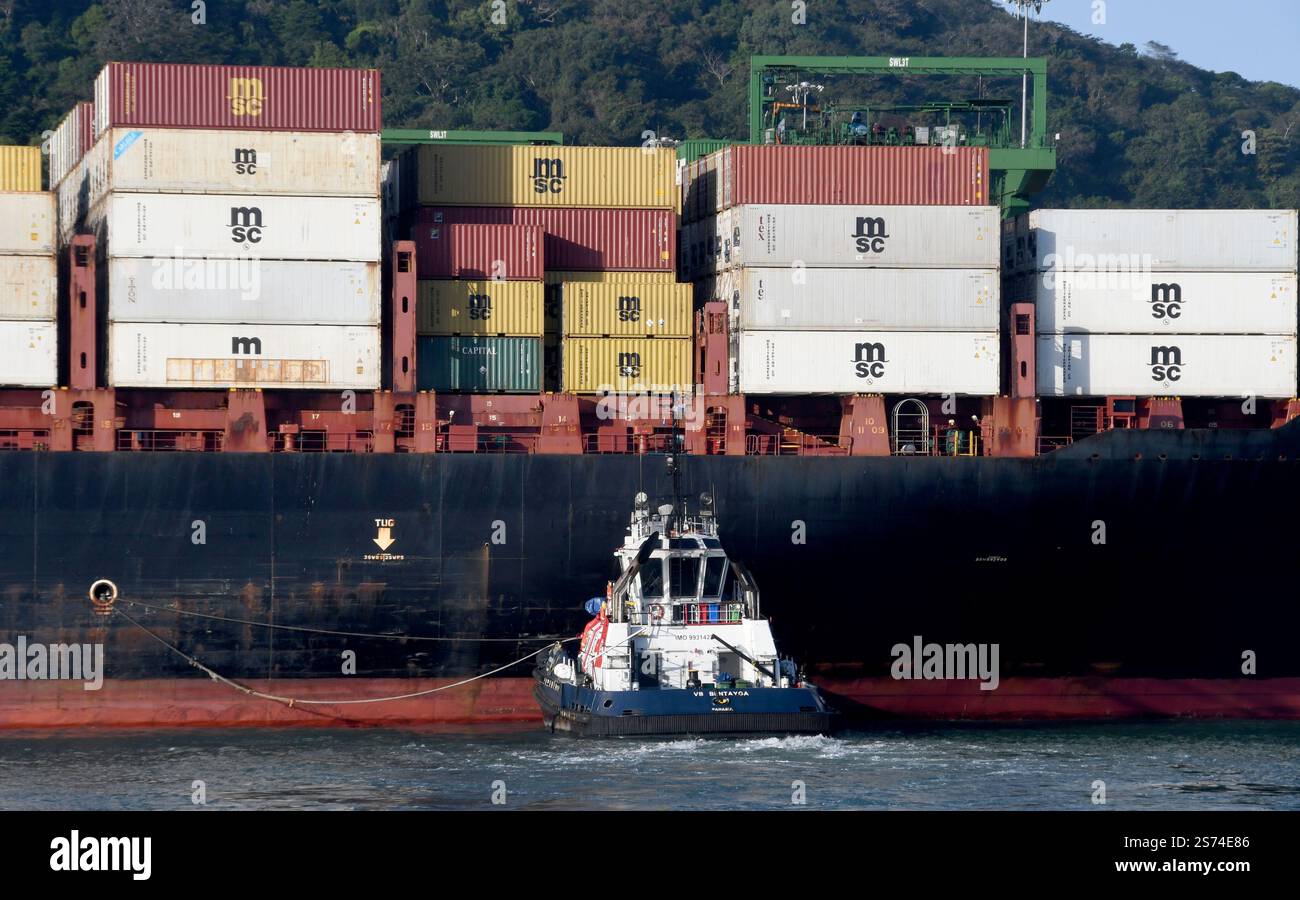 Balboa, USA. 13th Jan, 2025. Containers are loaded on and off ships at ...