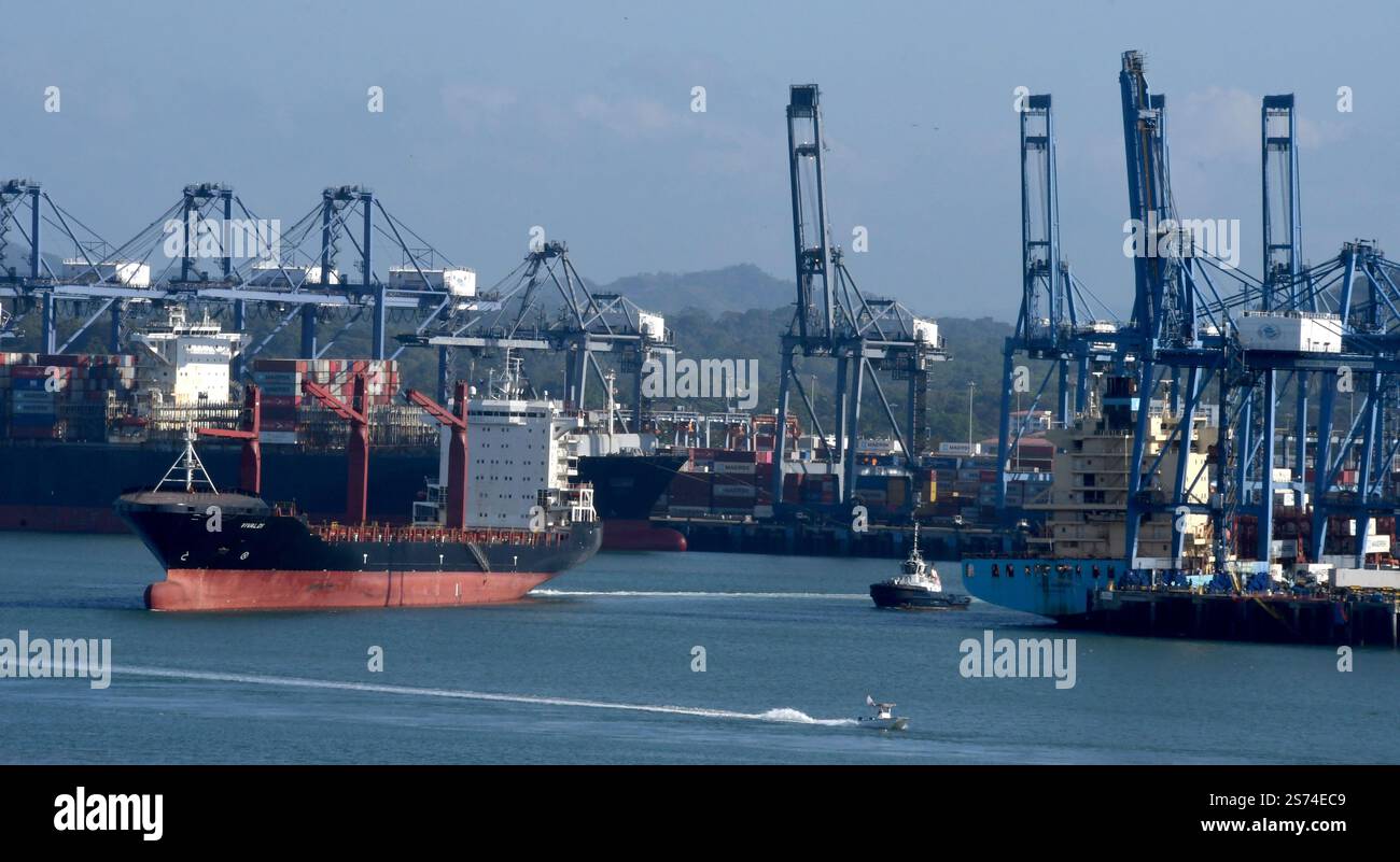 Balboa, USA. 12th Jan, 2025. Containers are loaded on and off ships at ...