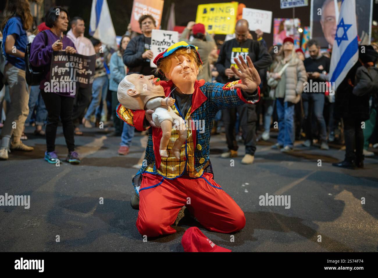 Tel Aviv, Israel. 18th Jan, 2025. A demonstrator dressed as a clown ...