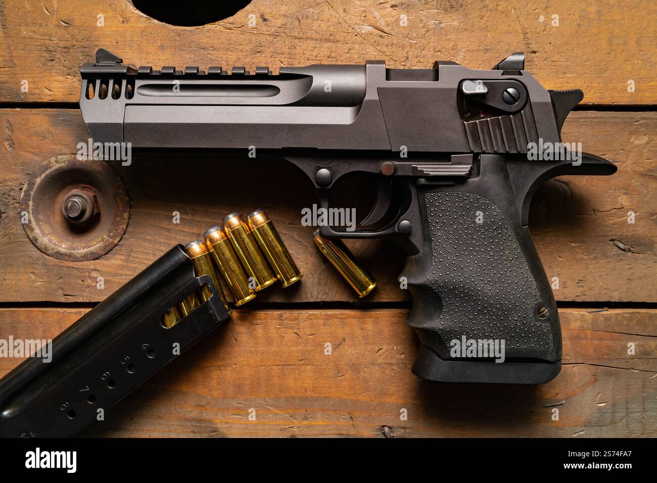 Tactical powerful Magnum 44 caliber pistol and cartridges, close-up ...
